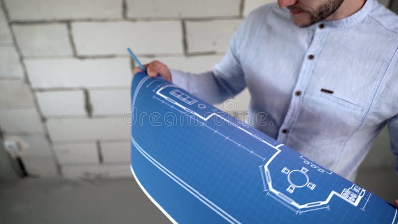 A Construction Engineer with Blueprints Stock Video - Video of plan ...