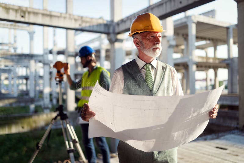 Construction Engineer with Foreman Worker Checking Construction Site ... Construction Engineer with Foreman Worker Checking Construction Site ...