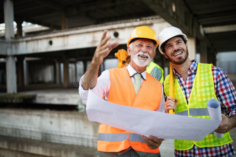 Construction Engineer with Foreman Worker Checking Construction Site ... Construction Engineer with Foreman Worker Checking Construction Site ...