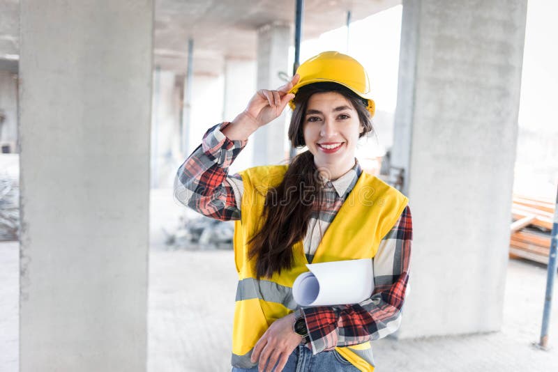 Construction Engineer Girl with Drawings at Hand Stock Photo - Image of ...