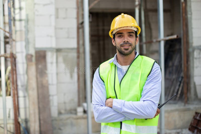 Portrait Man Engineer Standing at Construction Site Forward. Workers ...