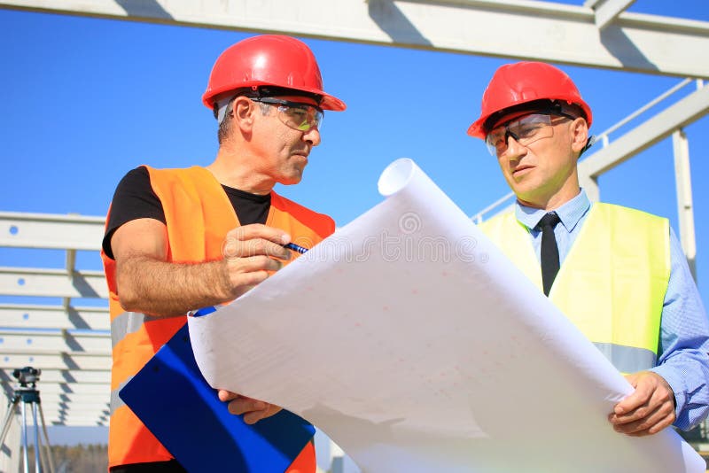 Construction Engineer and Manager Talking about the Project on ...