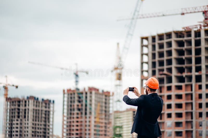 Engineer Take a Photo of Construction Site Stock Image - Image of ...