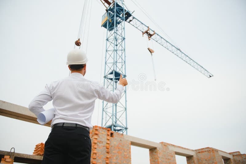 Construction Engineer Supervising Progress of Construction Project ...