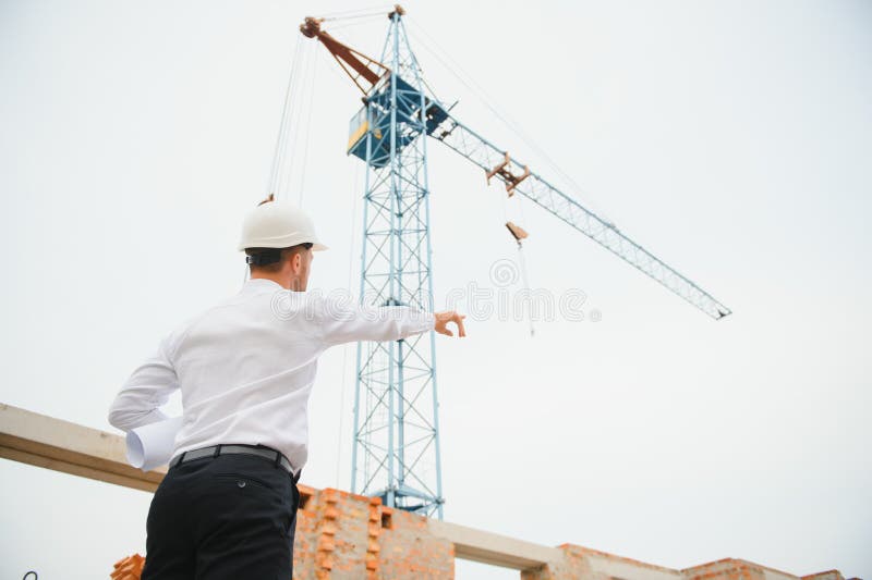 Construction Engineer Supervising Progress of Construction Project ...