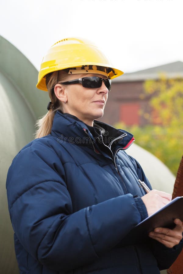 Construction Engineer Taking Notes Stock Image - Image of woman, hard ...