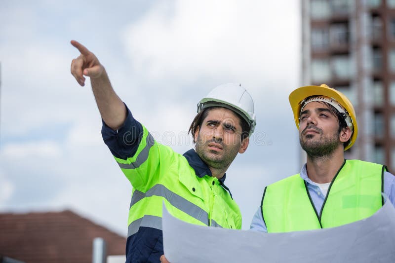 Construction Engineer Team. Two Man Engineer Wear Uniform Holding ...
