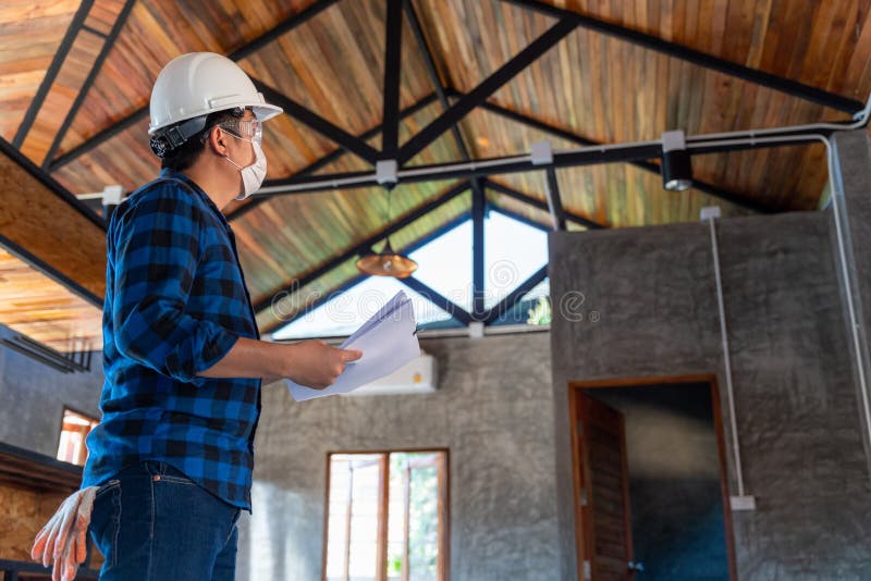 Construction Engineer Technician Inspect the Structure Under the Roof ...