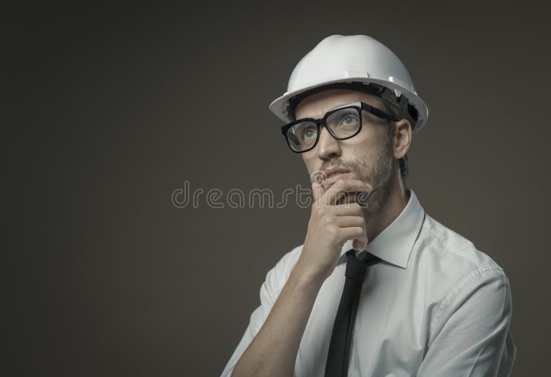 Construction man thinking stock image. Image of wonder - 21877985