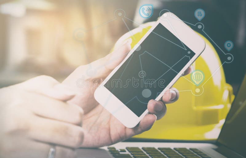 Construction Engineer is Using a Smartphone for Communication Stock ...
