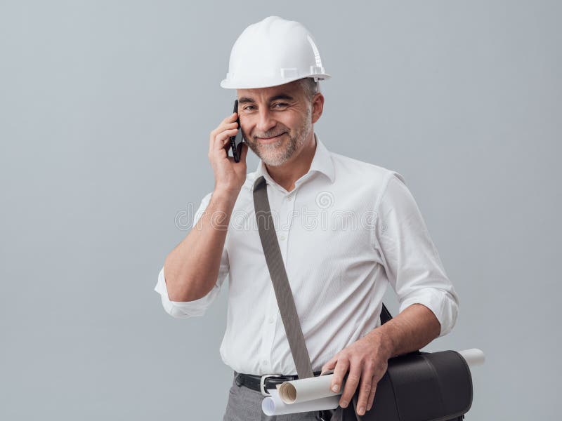 Construction Engineer Using a Smartphone Stock Image - Image of call ...