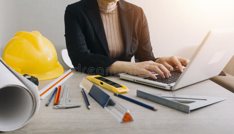 Construction Engineer Working at Blueprint To Build Large Commercial ...