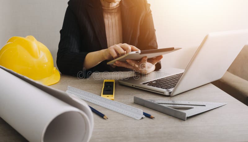 Construction Engineer Working at Blueprint To Build Large Commercial ...