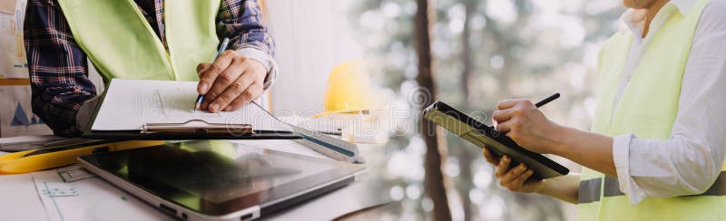 Construction Engineer Working at Blueprint To Build Large Commercial ...