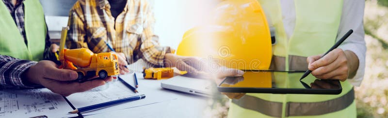 Construction Engineer Working at Blueprint To Build Large Commercial ...