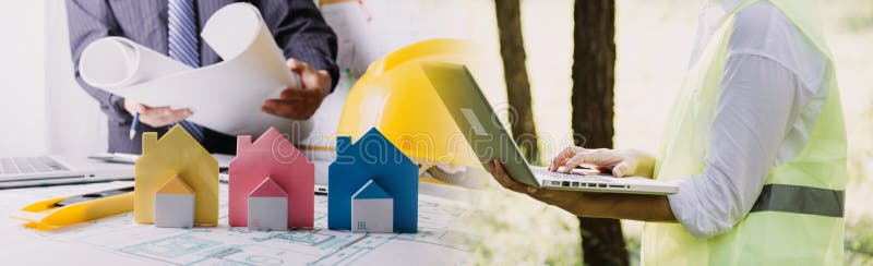 Construction Engineer Working at Blueprint To Build Large Commercial ...