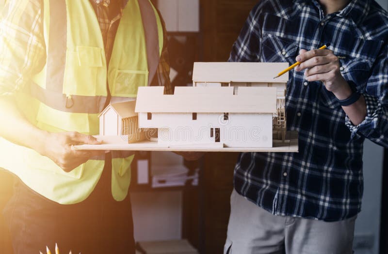 Construction Engineer Working at Blueprint To Build Large Commercial ...