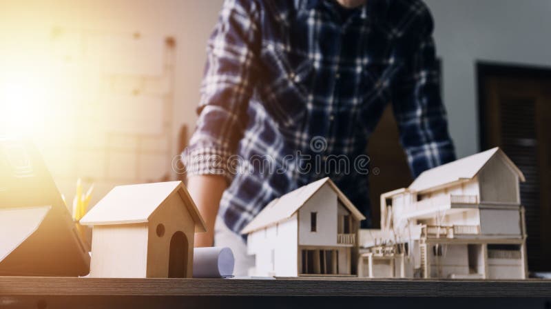 Construction Engineer Working at Blueprint To Build Large Commercial ...