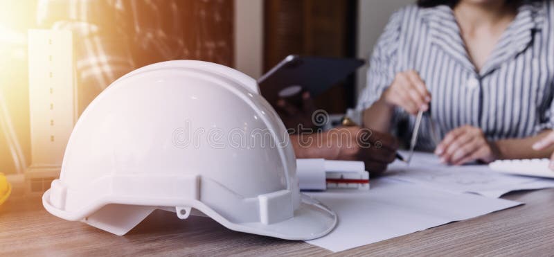Construction Engineer Working at Blueprint To Build Large Commercial ...