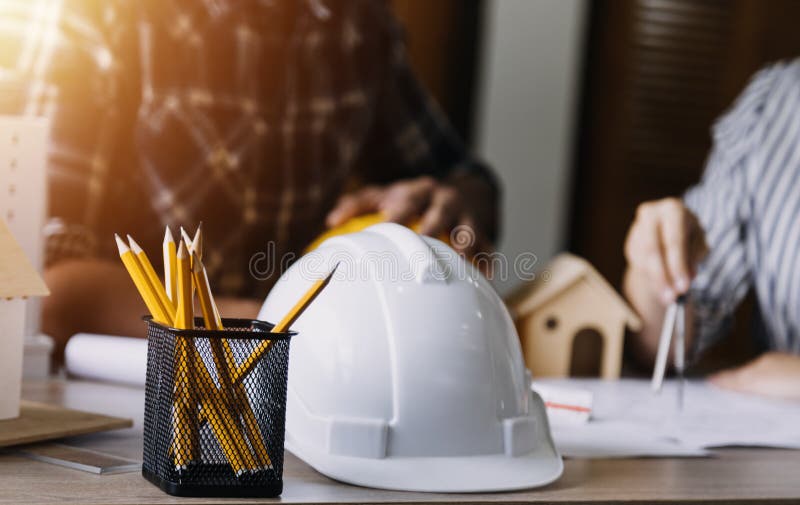 Construction Engineer Working at Blueprint To Build Large Commercial ...