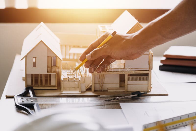 Construction Engineer Working at Blueprint To Build Large Commercial ...