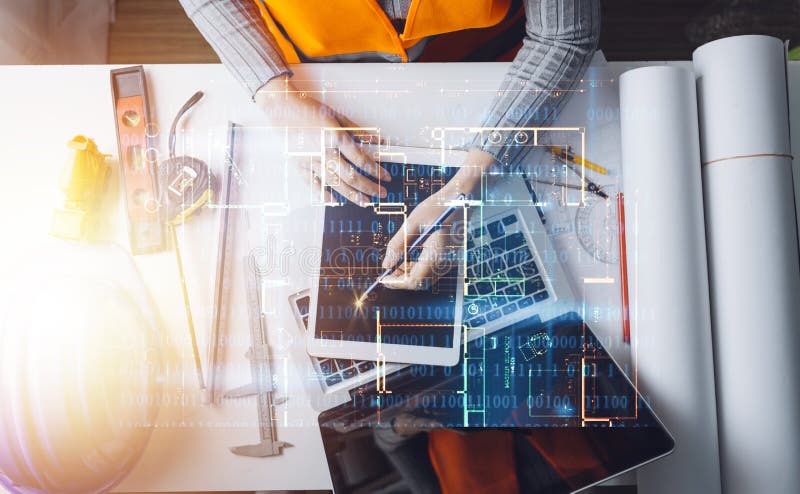 Construction Engineer Working at Blueprint To Build Large Commercial ...