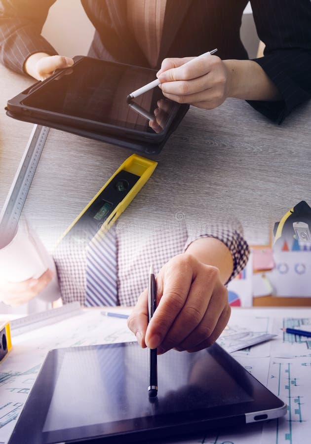 Construction Engineer Working at Blueprint To Build Large Commercial ...