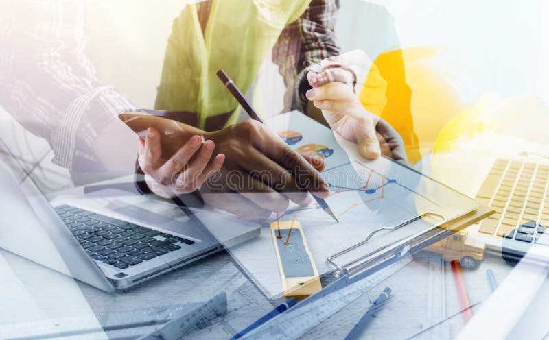 Construction Engineer Working at Blueprint To Build Large Commercial ...