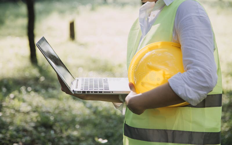 Construction Engineer Working at Blueprint To Build Large Commercial ...