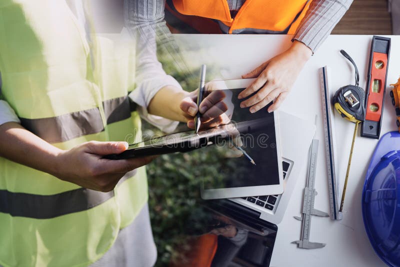 Construction Engineer Working at Blueprint To Build Large Commercial ...