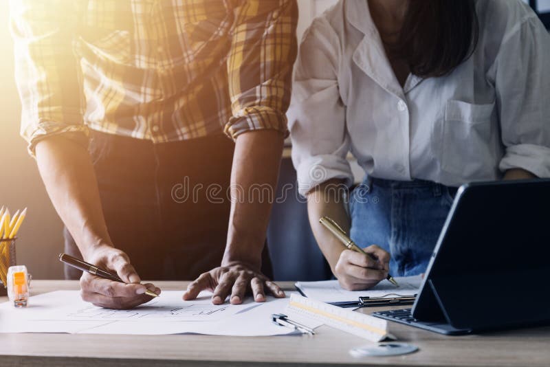 Construction Engineer Working at Blueprint To Build Large Commercial ...