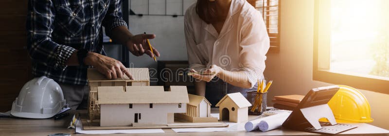 Construction Engineer Working at Blueprint To Build Large Commercial ...