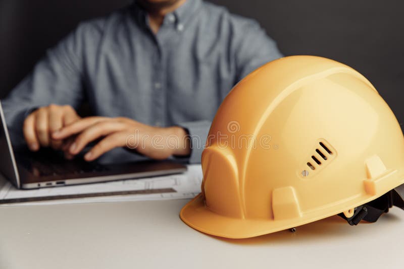 Construction Engineer Working on Laptop. Building Theme Stock Photo ...