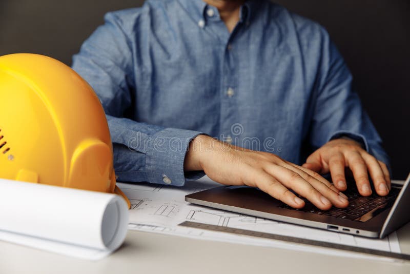 Construction Engineer Working with Laptop at His Office Stock Photo ...