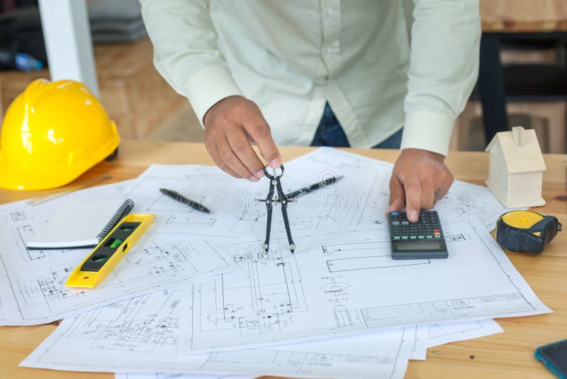 Construction Engineering. Architect Drawing Blueprints and Engineering ...