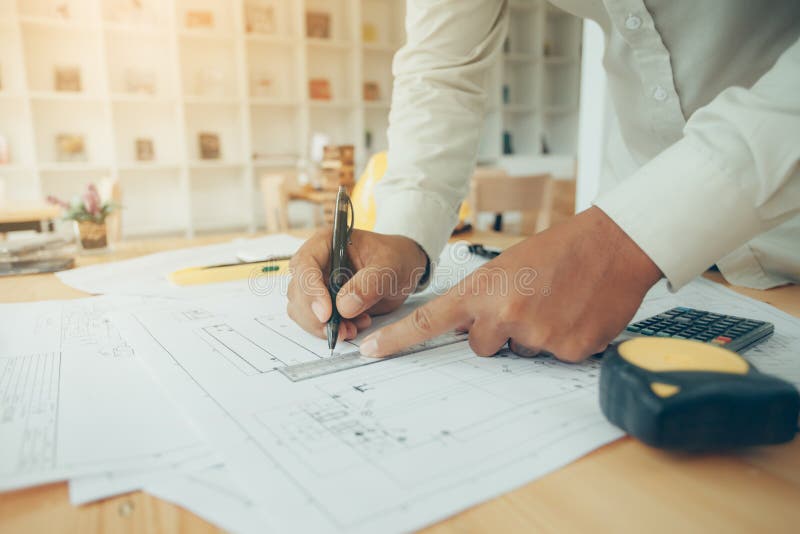 Construction Engineering. Architect Drawing Blueprints and Engineering ...