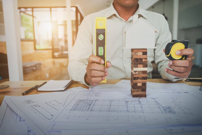 Construction Engineering. Architect Drawing Blueprints and Engineering ...