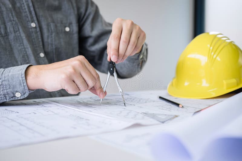 Construction Engineering or Architect Hands Working on Blueprint ...