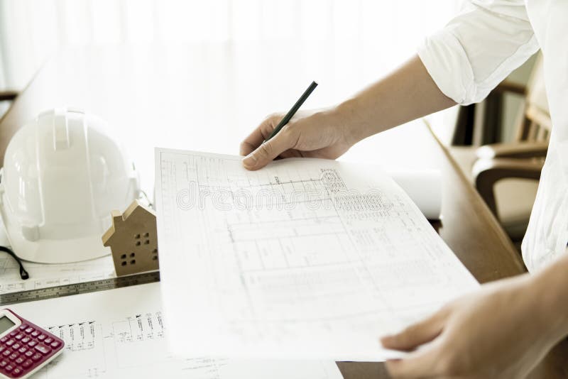 Construction Engineering Concept, Engineering Working on Desk with Cad ...