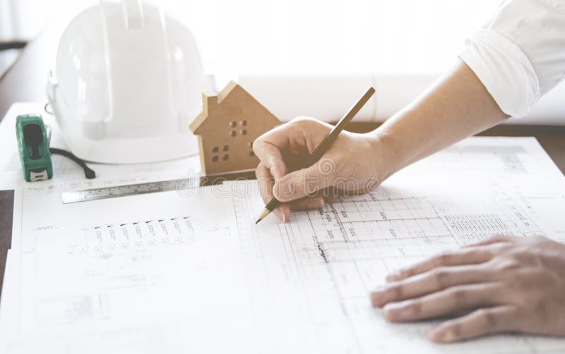 Construction Engineering Concept, Engineering Working on Desk with Cad ...