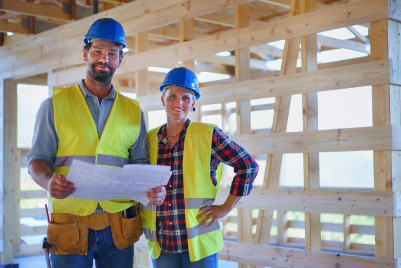 Construction Engineers or Architects with Blueprints Visiting Eco ...