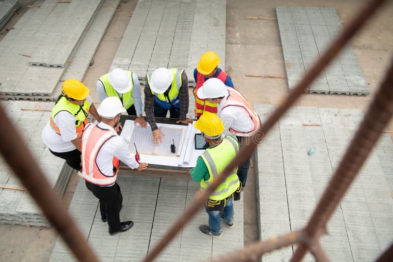 Construction Engineers, Architects, and Foremen Form a Group. Stock ...
