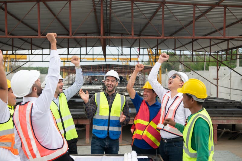Construction Engineers, Architects, and Foremen Form a Group. Participate in a Meeting To Plan ...