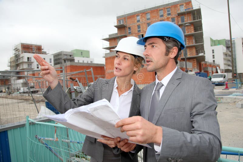 Construction Engineers on Building Site Stock Image - Image of ...