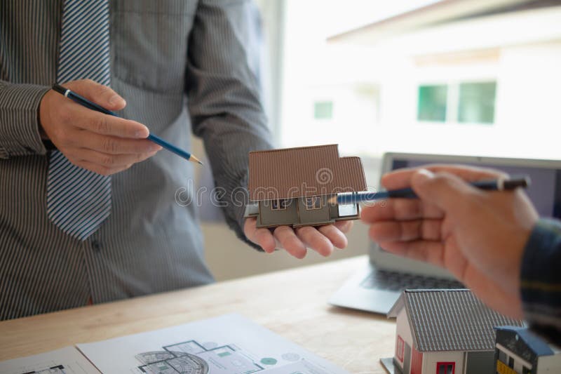 Construction Engineers Discuss and Exchange Ideas with Architects To ...