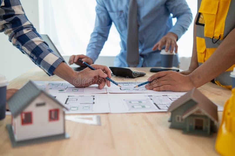 Construction Engineers Discuss and Exchange Ideas with Architects To ...