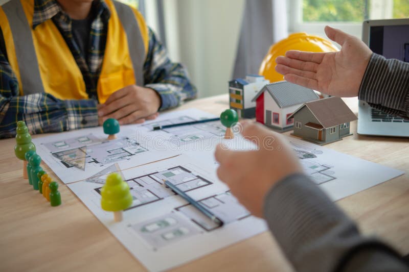 Construction Engineers Discuss and Exchange Ideas with Architects To ...