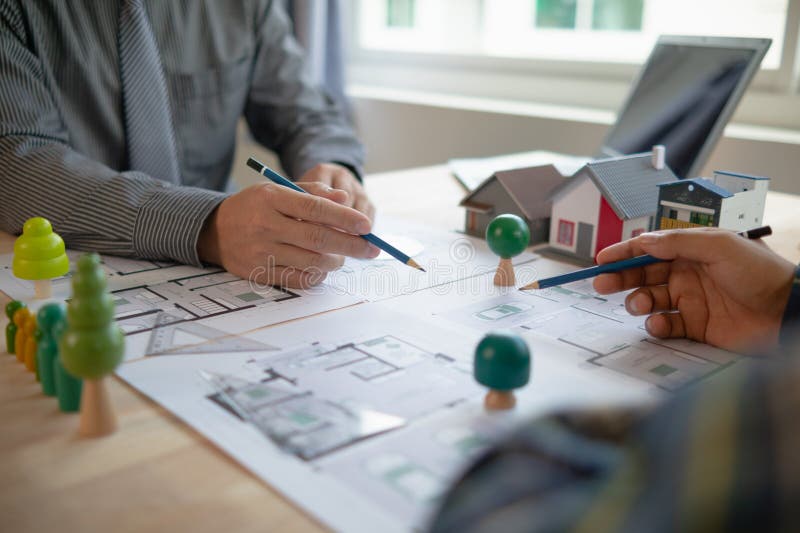 Construction Engineers Discuss and Exchange Ideas with Architects To ...