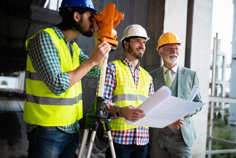 Construction Engineers Discussion with Architects at Construction or ...