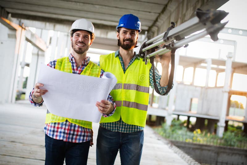 Construction Engineers Discussion with Architects at Construction or ...